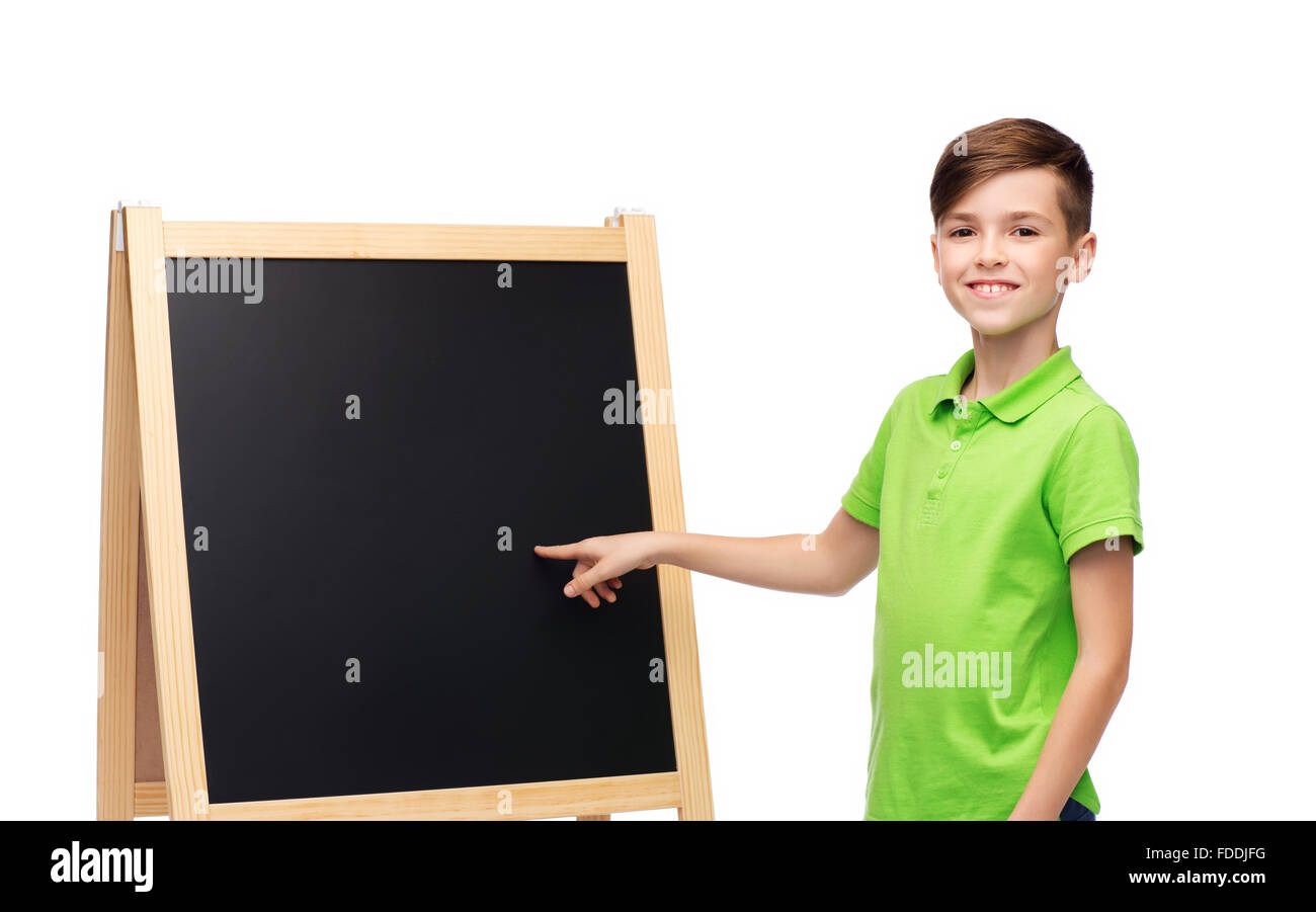 happy boy with chalk and blank school blackboard Stock Photo - Alamy