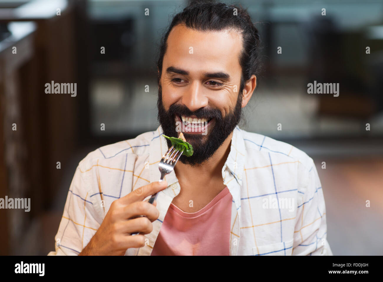 happy man having dinner at restaurant Stock Photo - Alamy