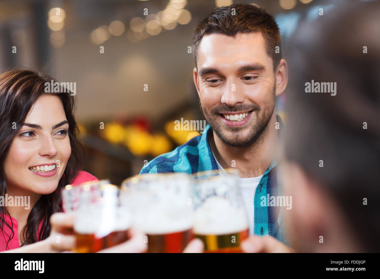 Happy friends restaurant dinner beer hi-res stock photography and ...