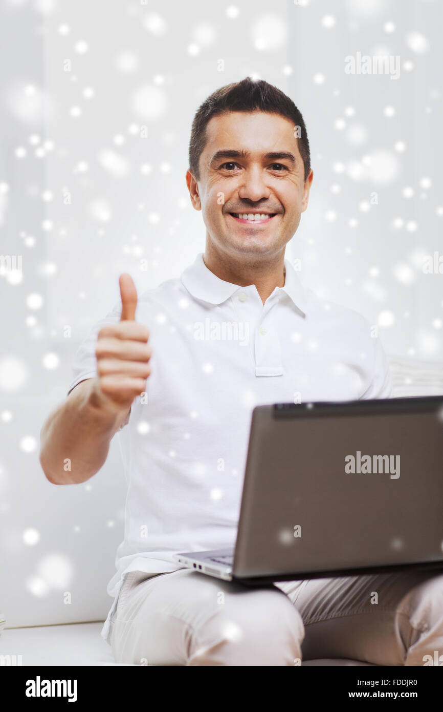 happy man working with laptop computer at home Stock Photo - Alamy