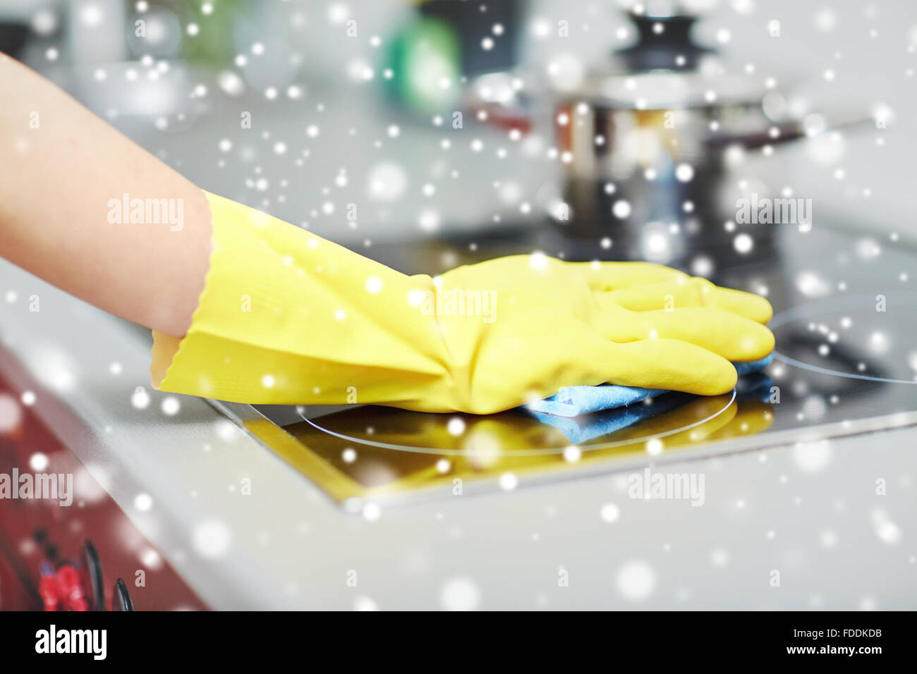 close up of woman cleaning cooker at home kitchen Stock Photo - Alamy