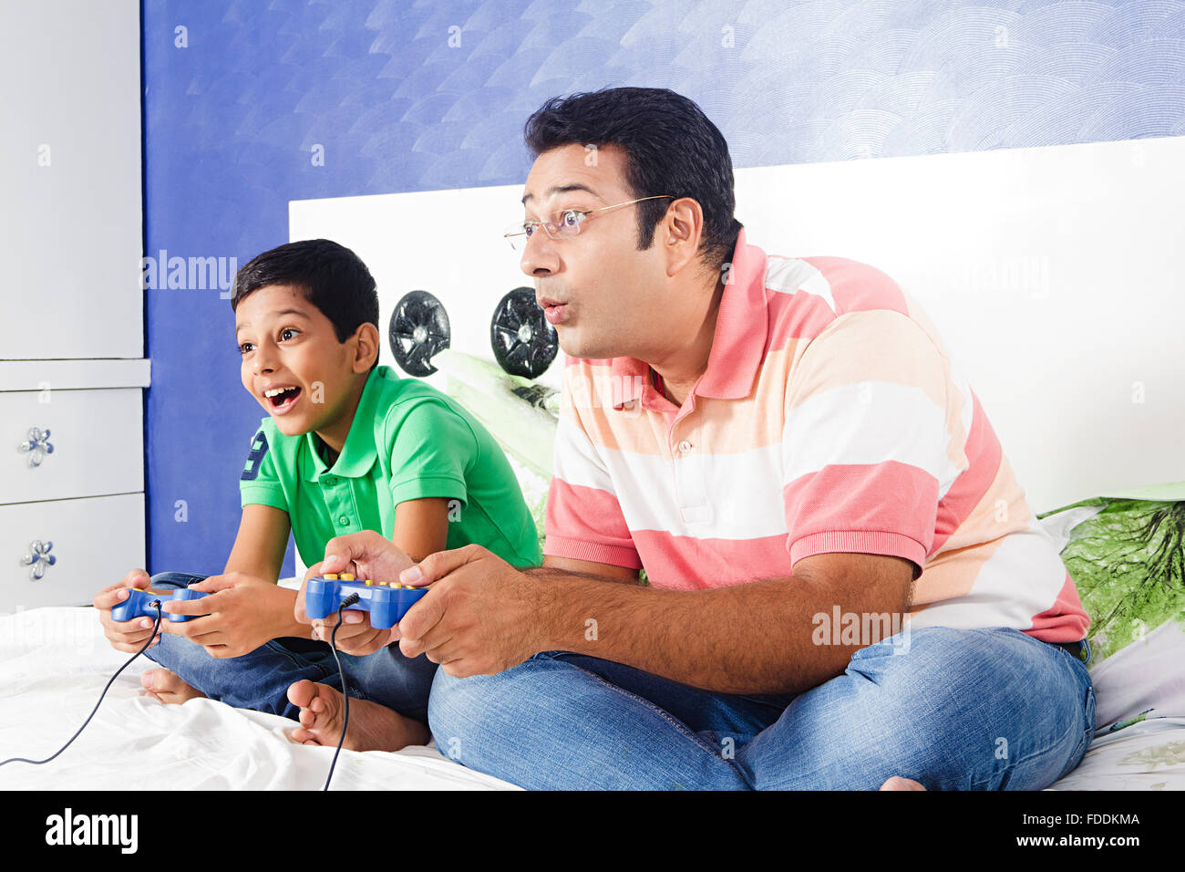 2 People Father and Kid Son Sitting Bedroom Playing Video Game Stock ...