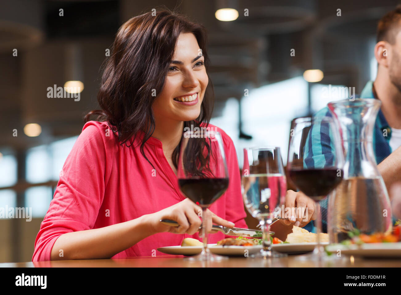 happy woman having dinner at restaurant Stock Photo - Alamy