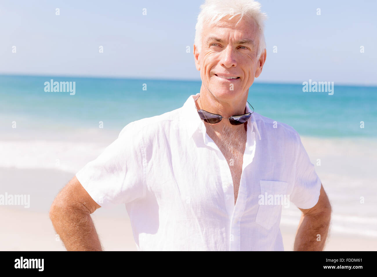 Handsome man on the beach Stock Photo - Alamy