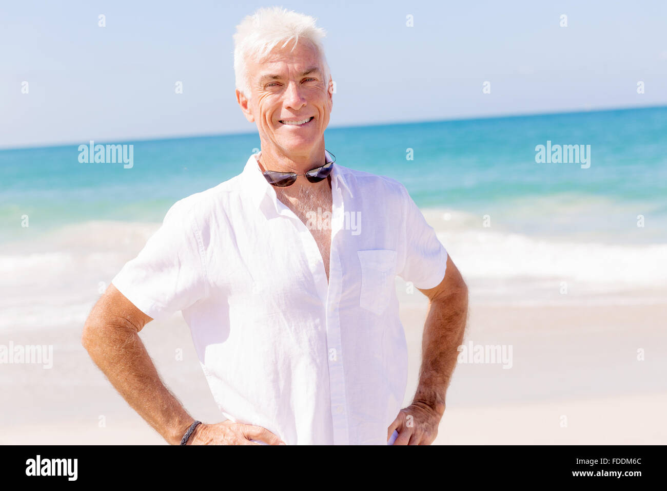 Handsome man on the beach Stock Photo - Alamy