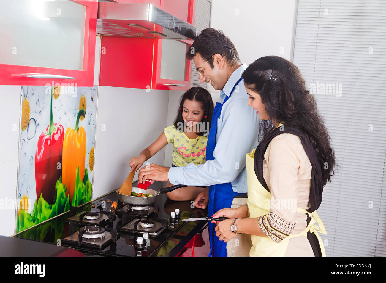 Kids parents kitchen hi-res stock photography and images - Alamy