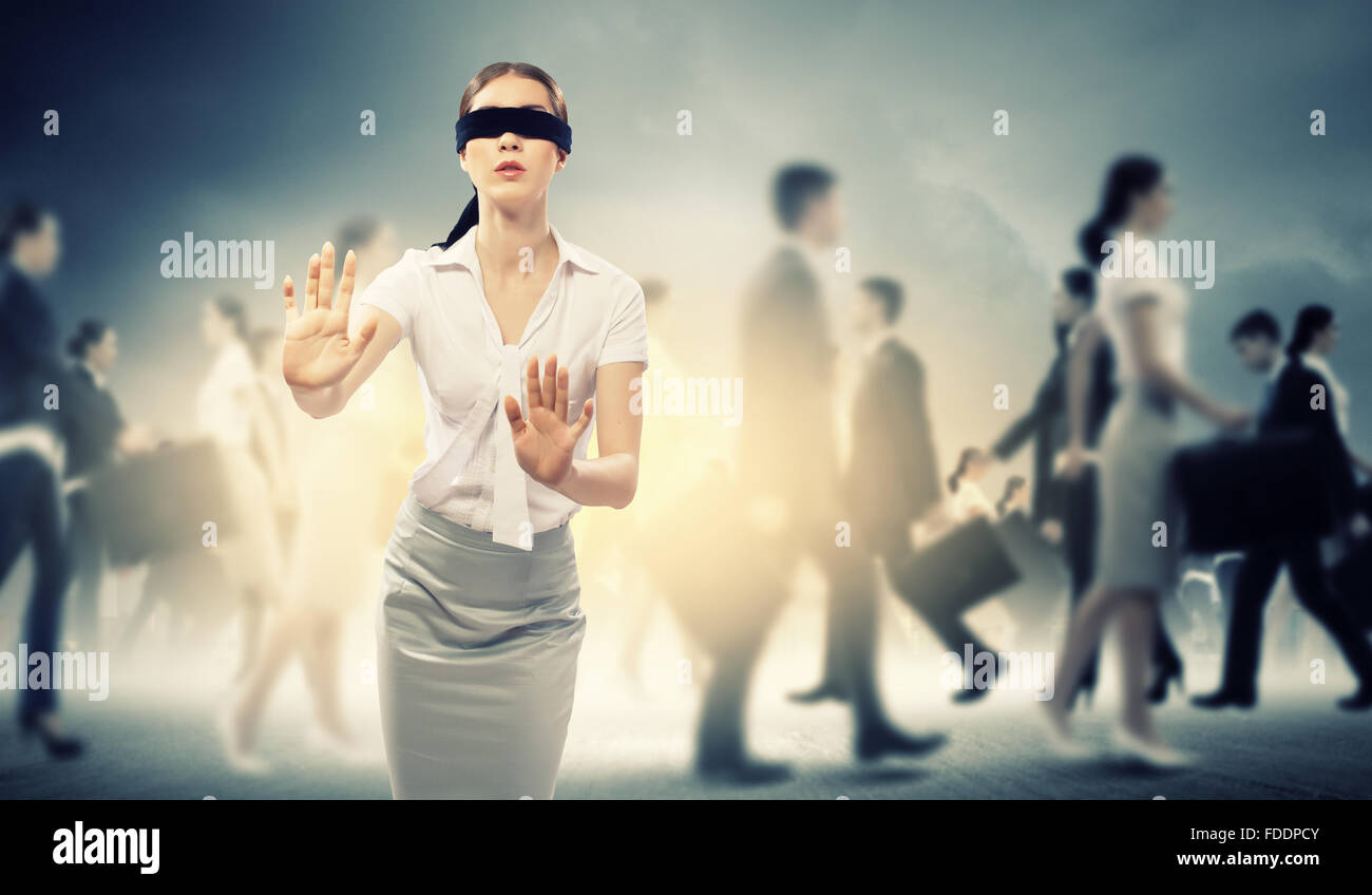 Image of businesswoman in blindfold walking among group of people Stock ...