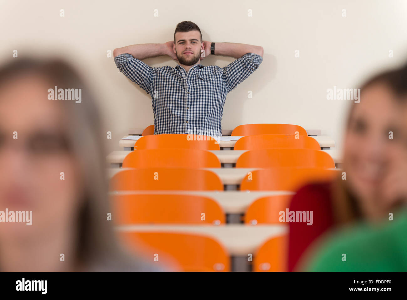 Young Group Of Attractive Teenage Students In A College Classroom ...