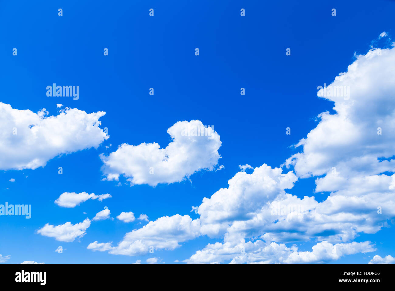 Clouds in the sky on a clear day Stock Photo - Alamy