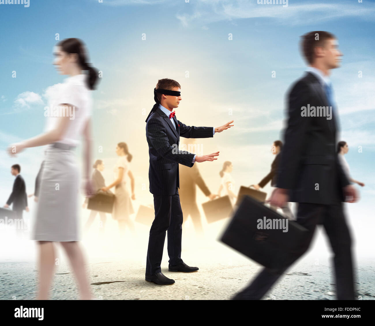 Image of businessman in blindfold walking among group of people Stock ...