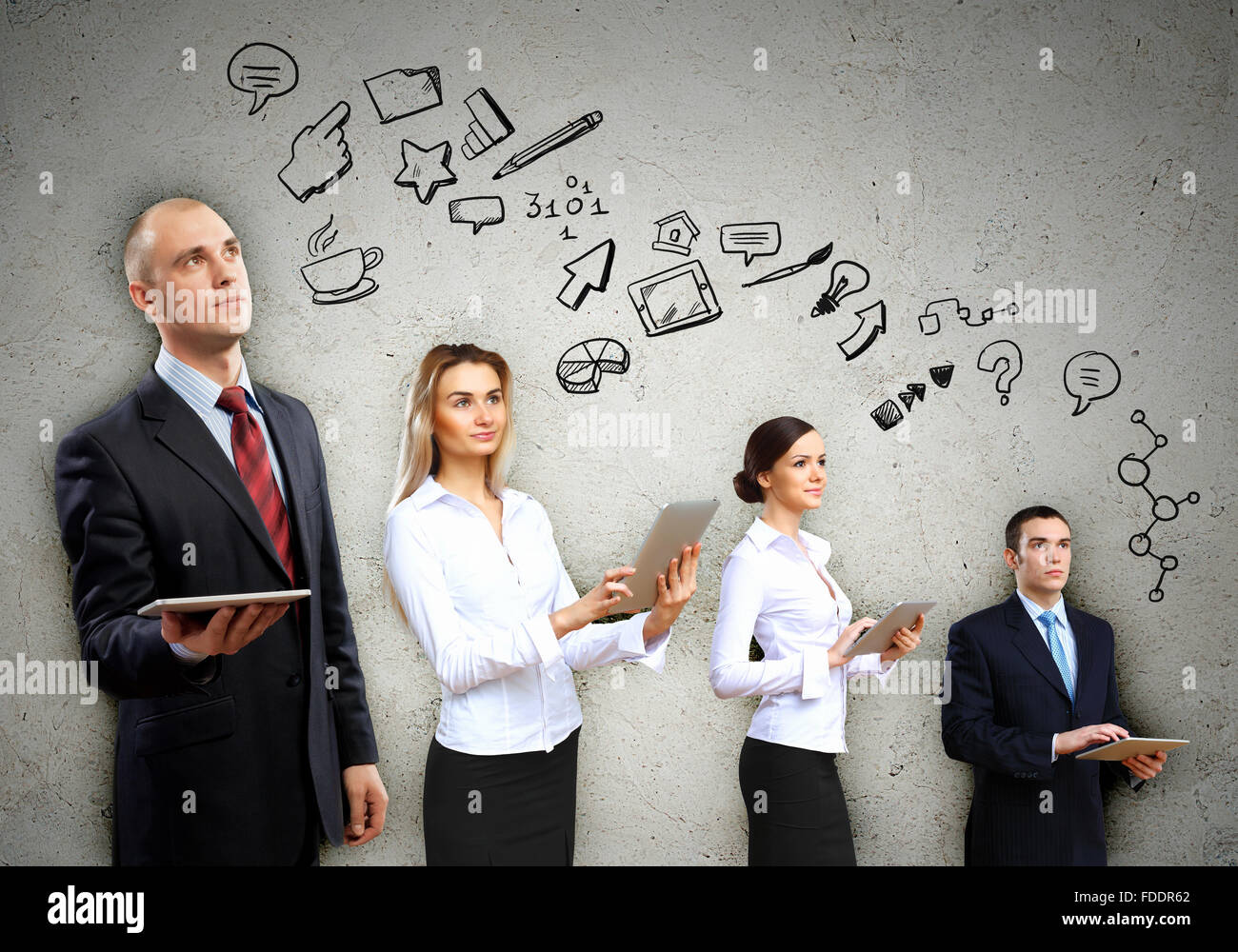 Image of four young businesspeople. Teamwork concept Stock Photo - Alamy