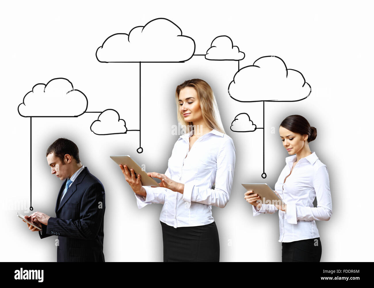 Three young people with tablet pc in hands Stock Photo - Alamy