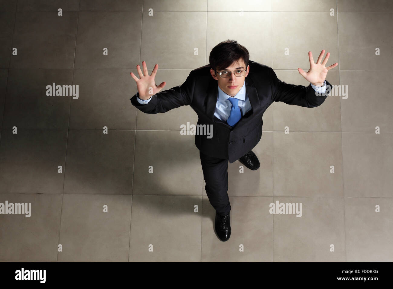 Image of young businessman in glasses. Top view Stock Photo - Alamy