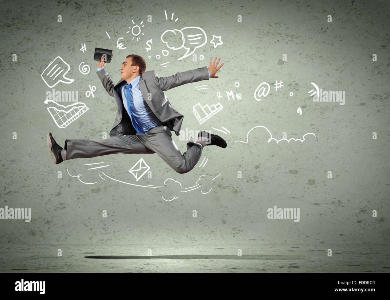 Image of jumping young businessman. Business collage Stock Photo - Alamy
