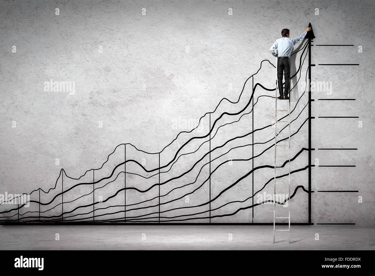 Back view image of businessman drawing graphics on wall Stock Photo - Alamy