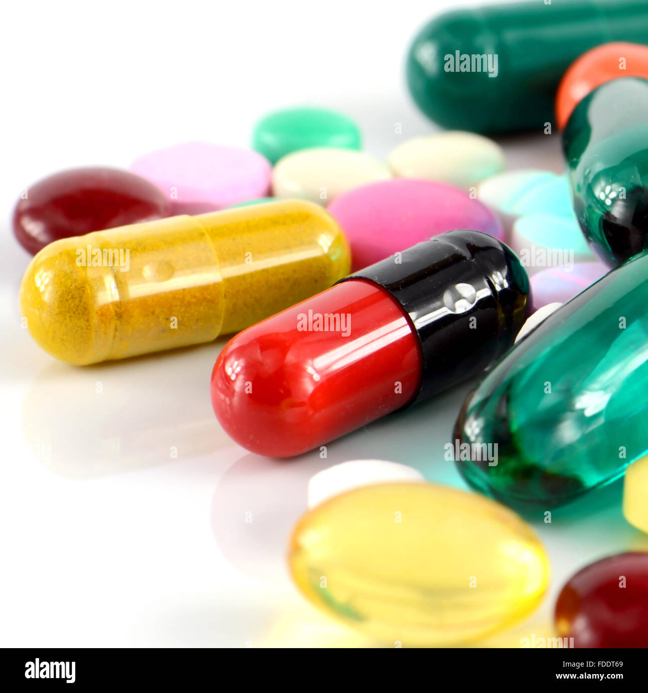 Colorful of oral medications on White Background Stock Photo - Alamy