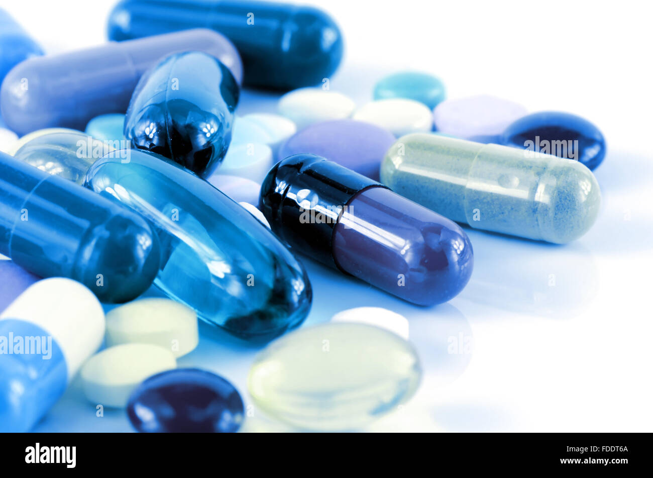 Colorful of oral medications on White Background Stock Photo - Alamy
