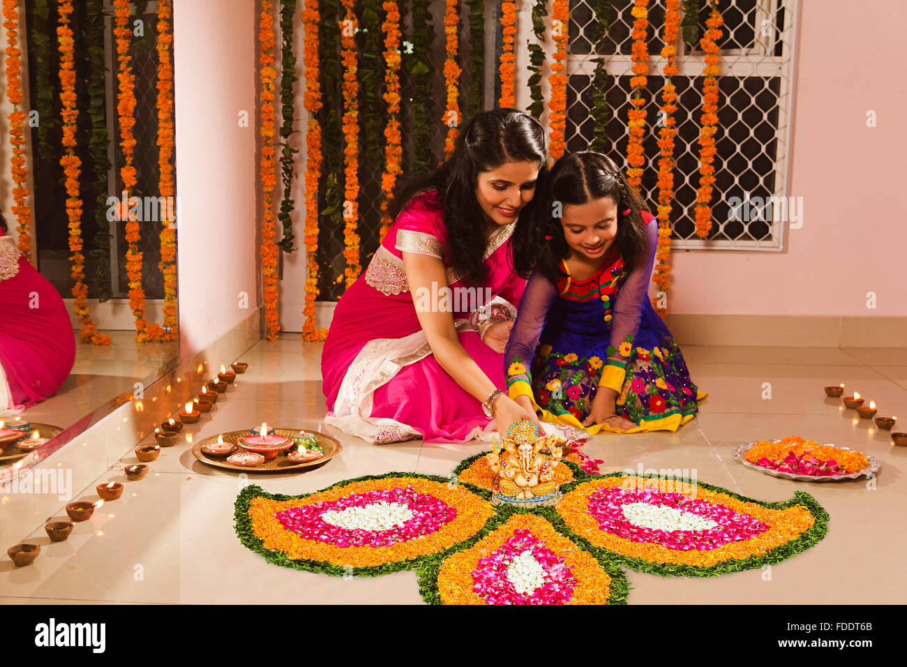 2 People mother and Kid Daughter Diwali Festivals Home Rangoli ...