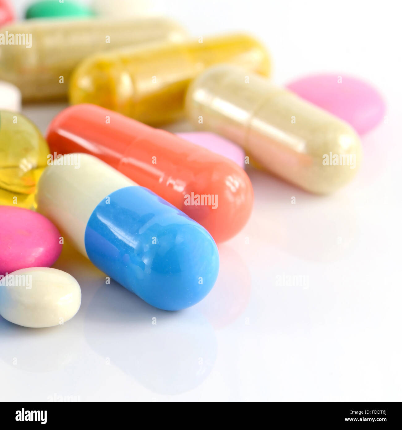 Colorful of oral medications on White Background Stock Photo - Alamy
