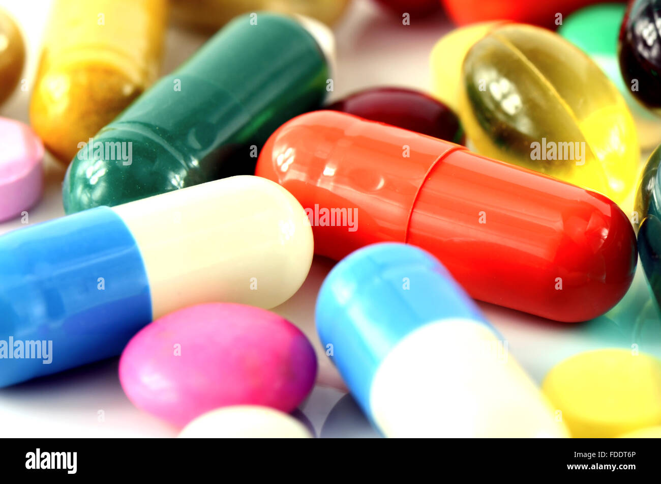Colorful of oral medications on White Background Stock Photo - Alamy