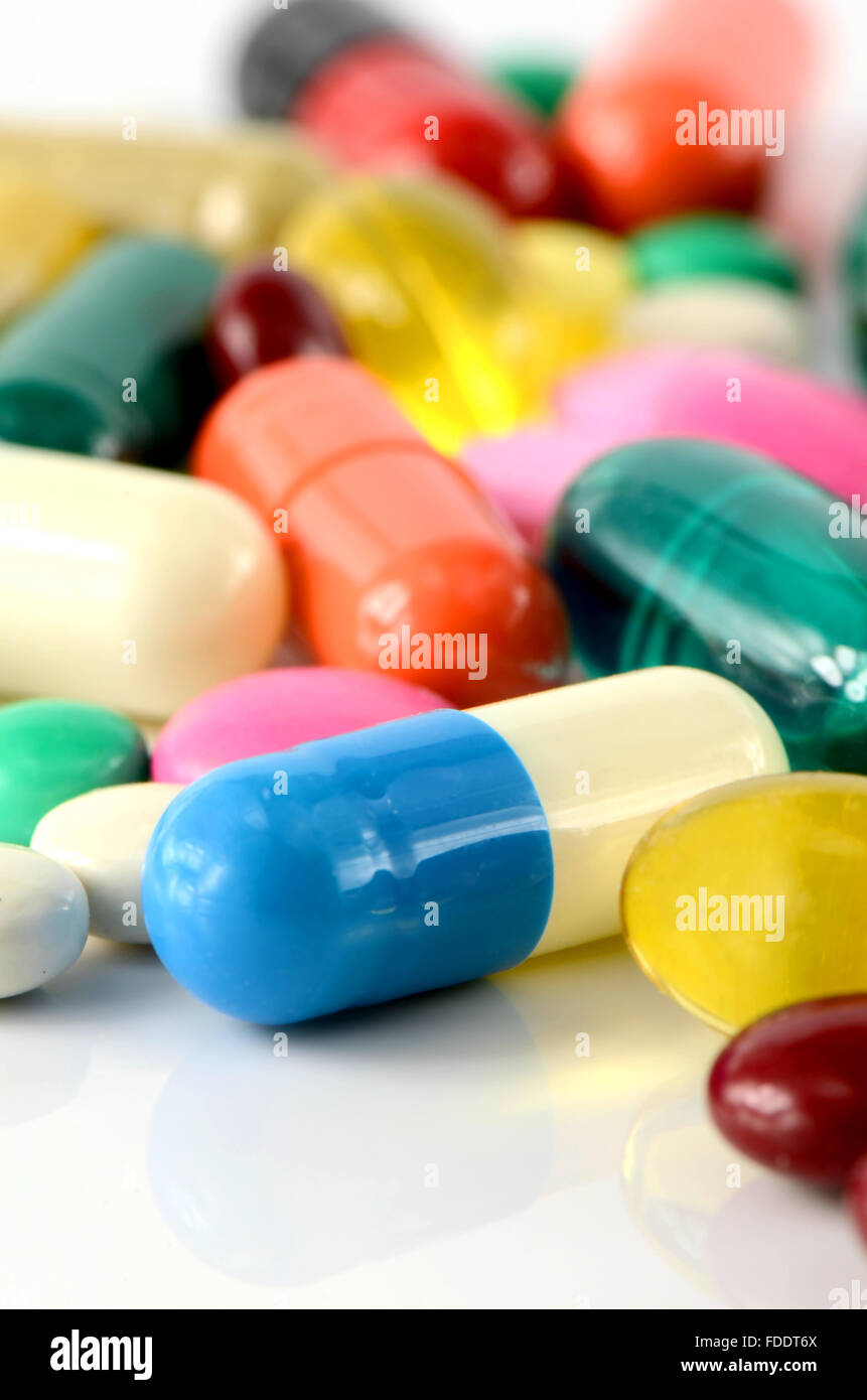 Colorful of oral medications on White Background Stock Photo - Alamy