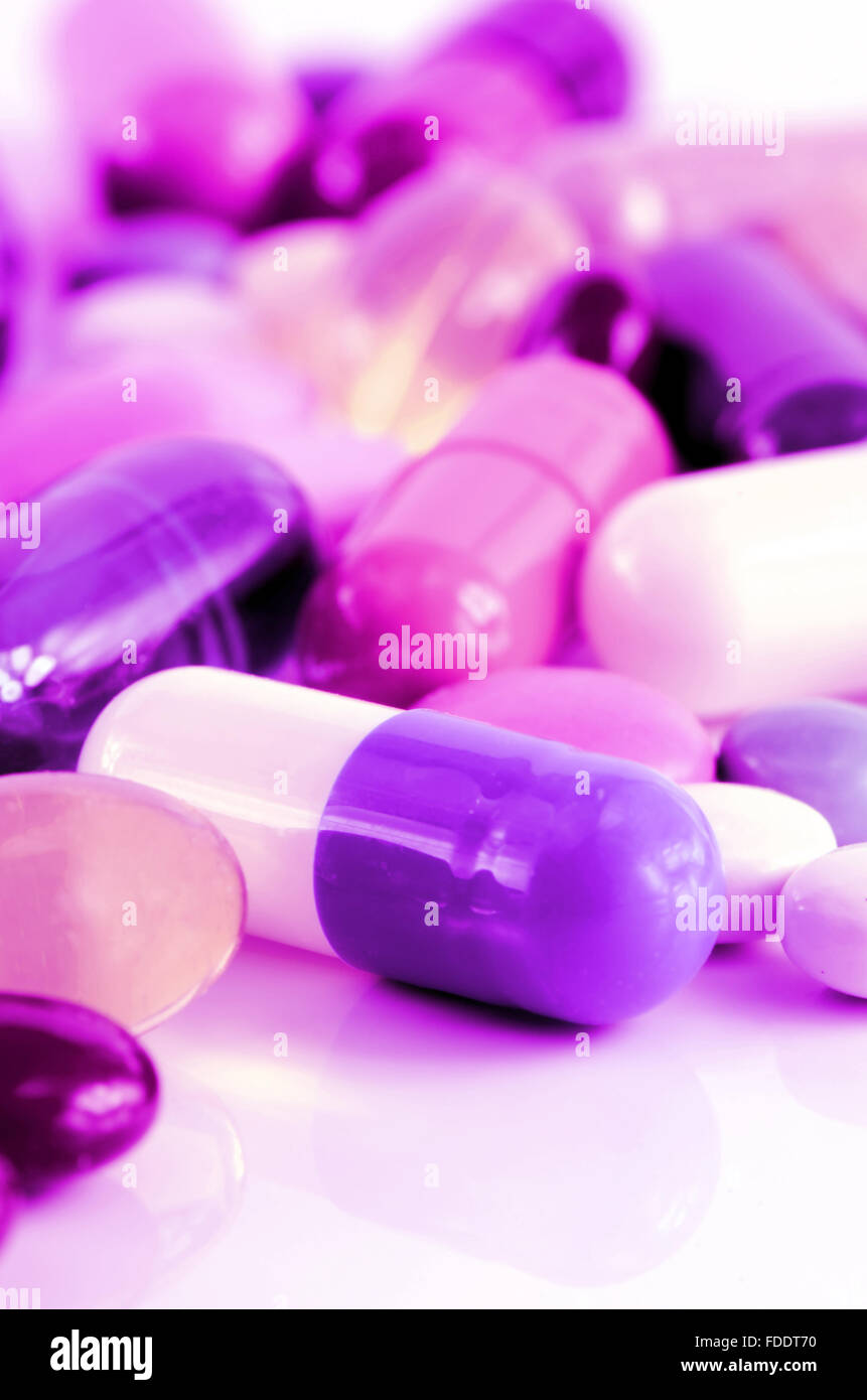 Colorful of oral medications on White Background Stock Photo - Alamy