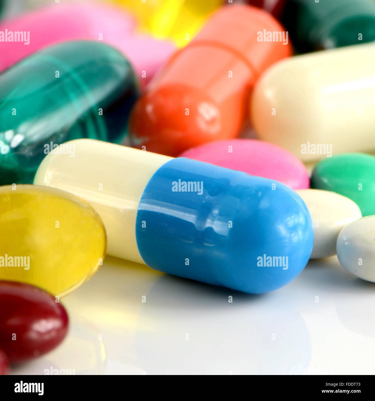 Colorful of oral medications on White Background Stock Photo - Alamy