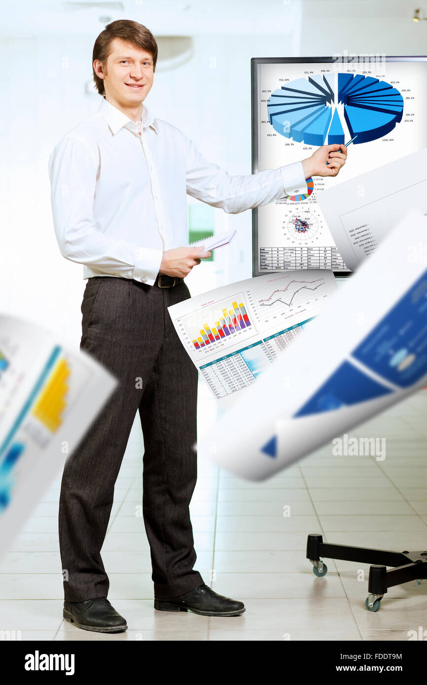 Image of young man making presentation on screen Stock Photo - Alamy