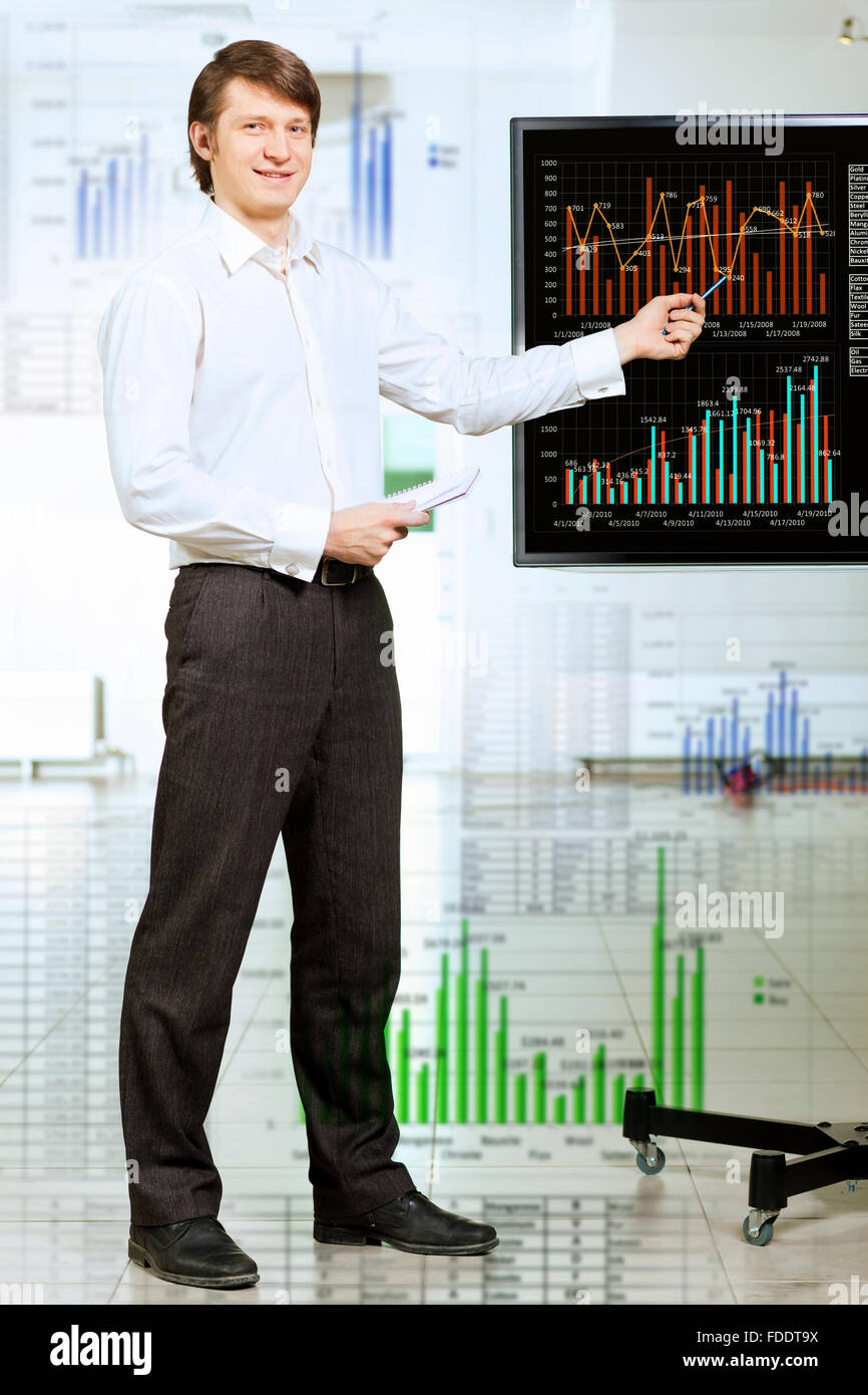 Image of young man making presentation on screen Stock Photo - Alamy