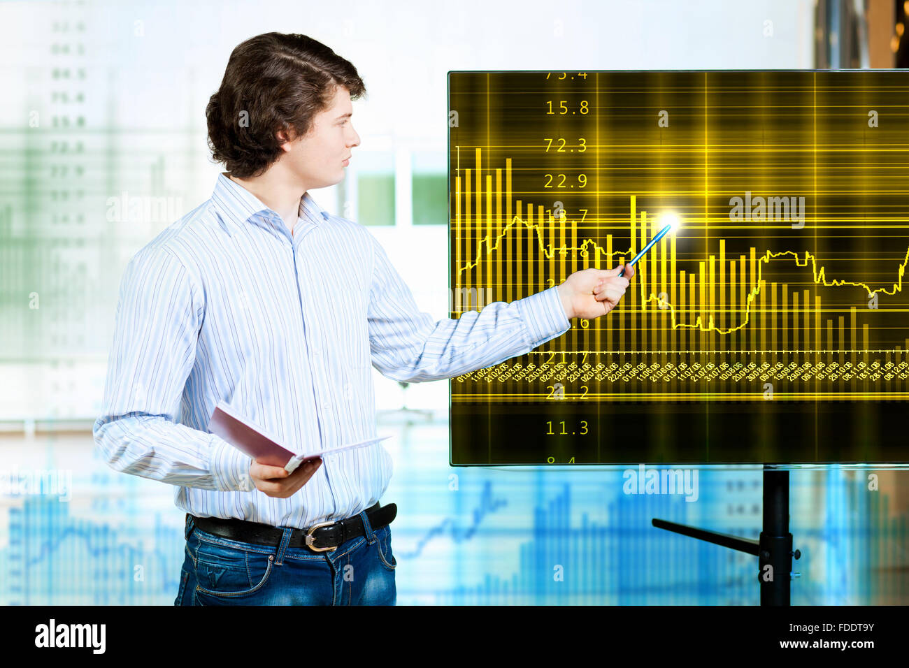 Image of young man making presentation on screen Stock Photo - Alamy