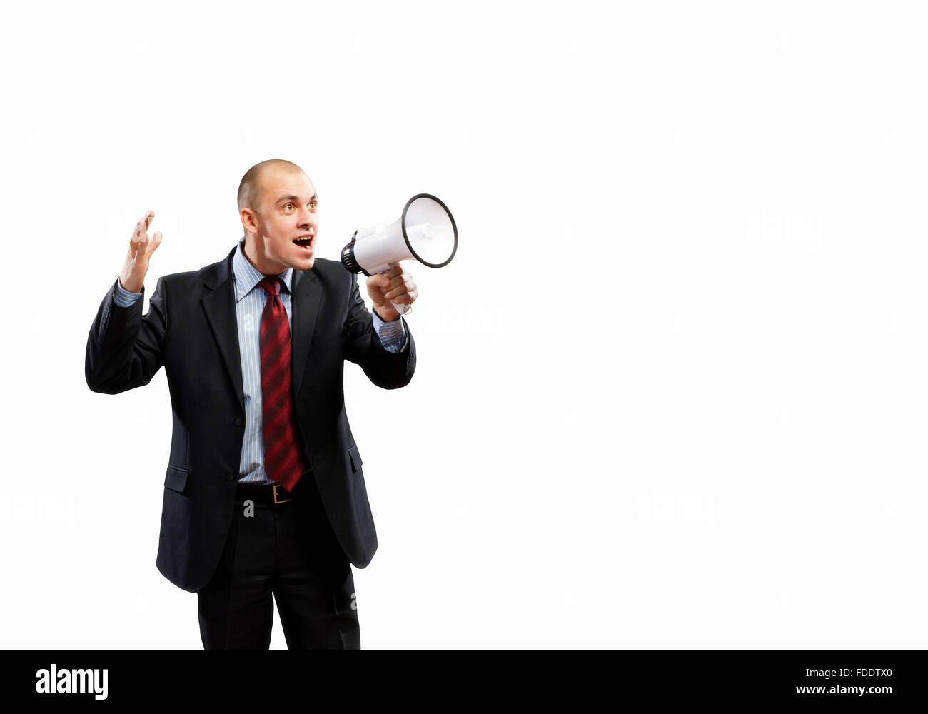 Image of angry businessman screaming in megaphone Stock Photo - Alamy