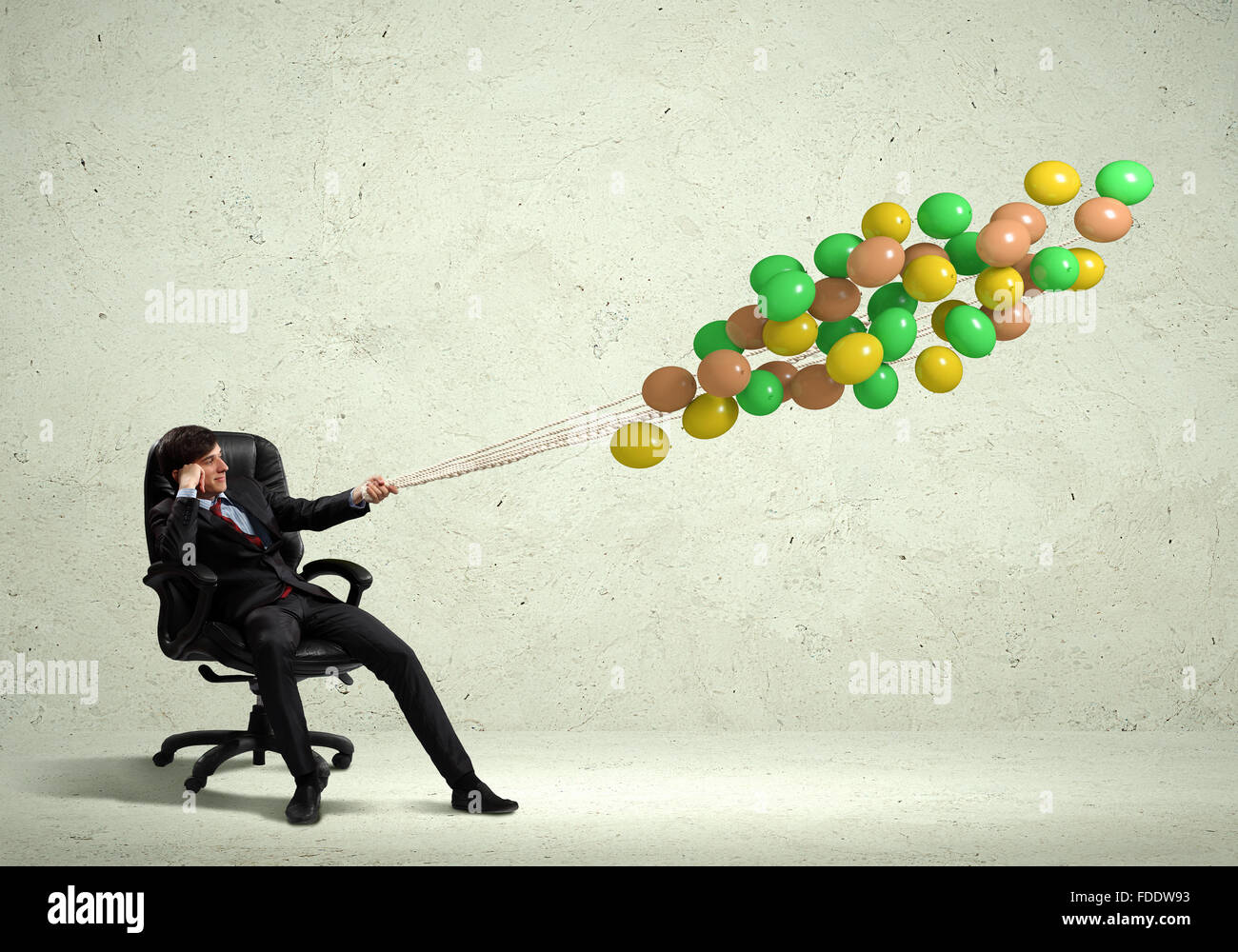 Image of businessman with bunch of color balloons Stock Photo - Alamy