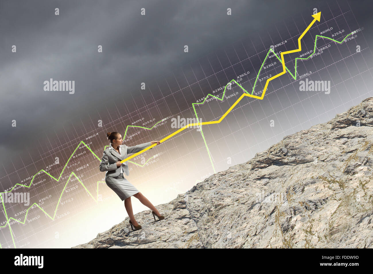 Image of businesswoman pulling graph of diagram Stock Photo - Alamy