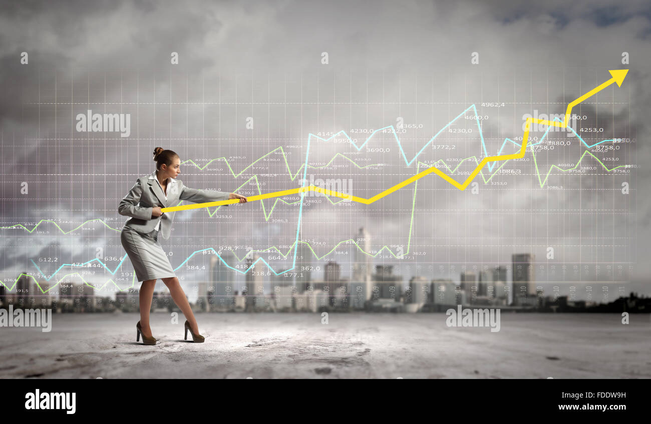 Image of businesswoman pulling graph of diagram Stock Photo - Alamy