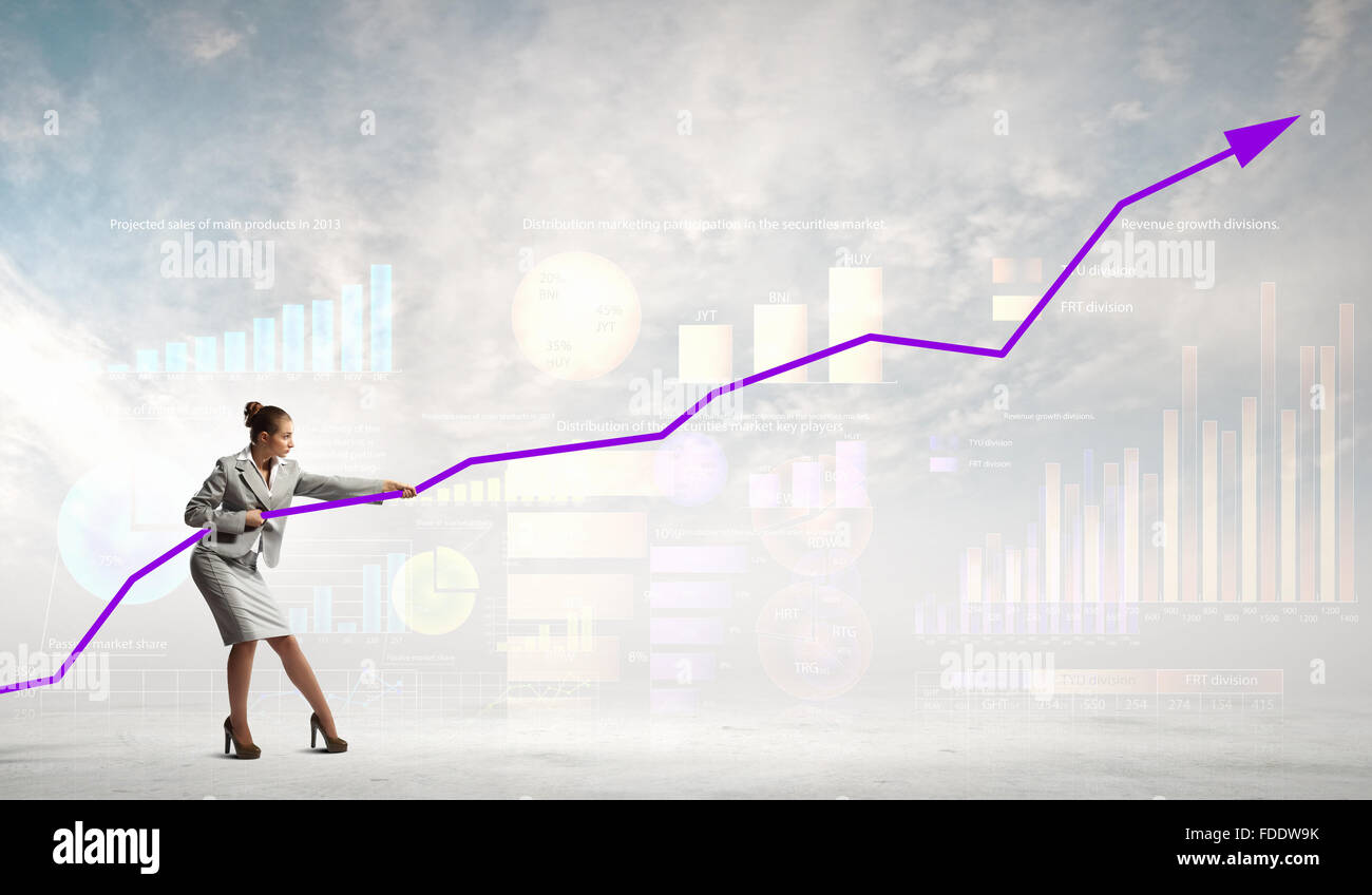Image of businesswoman pulling graph of diagram Stock Photo - Alamy
