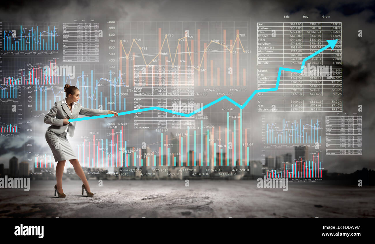 Image of businesswoman pulling graph of diagram Stock Photo - Alamy