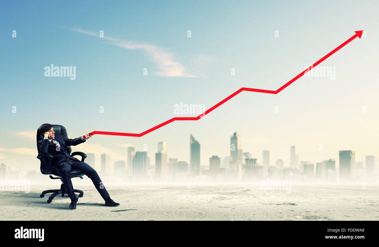 Image of young businessman pulling graph. Chart growth concept Stock ...