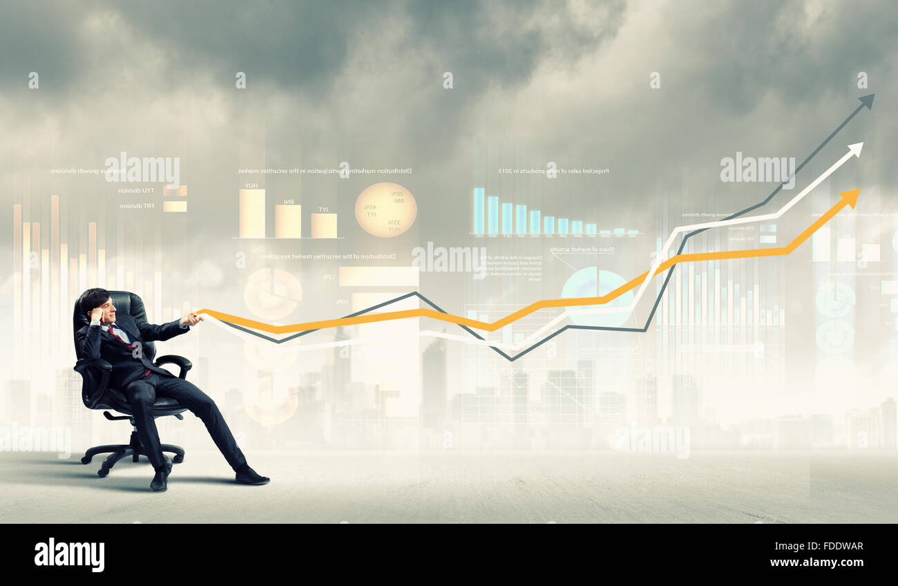 Image of young businessman pulling graph. Chart growth concept Stock ...