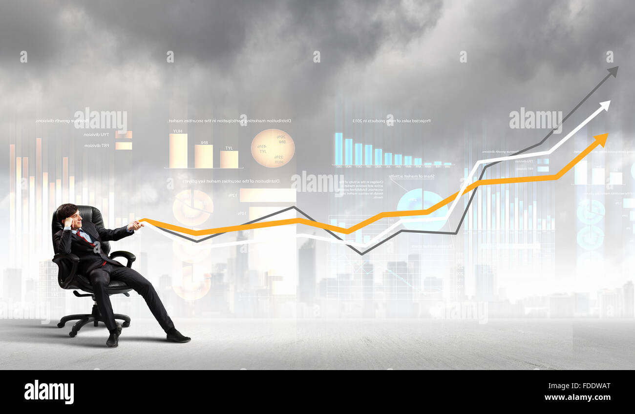 Image of young businessman pulling graph. Chart growth concept Stock ...