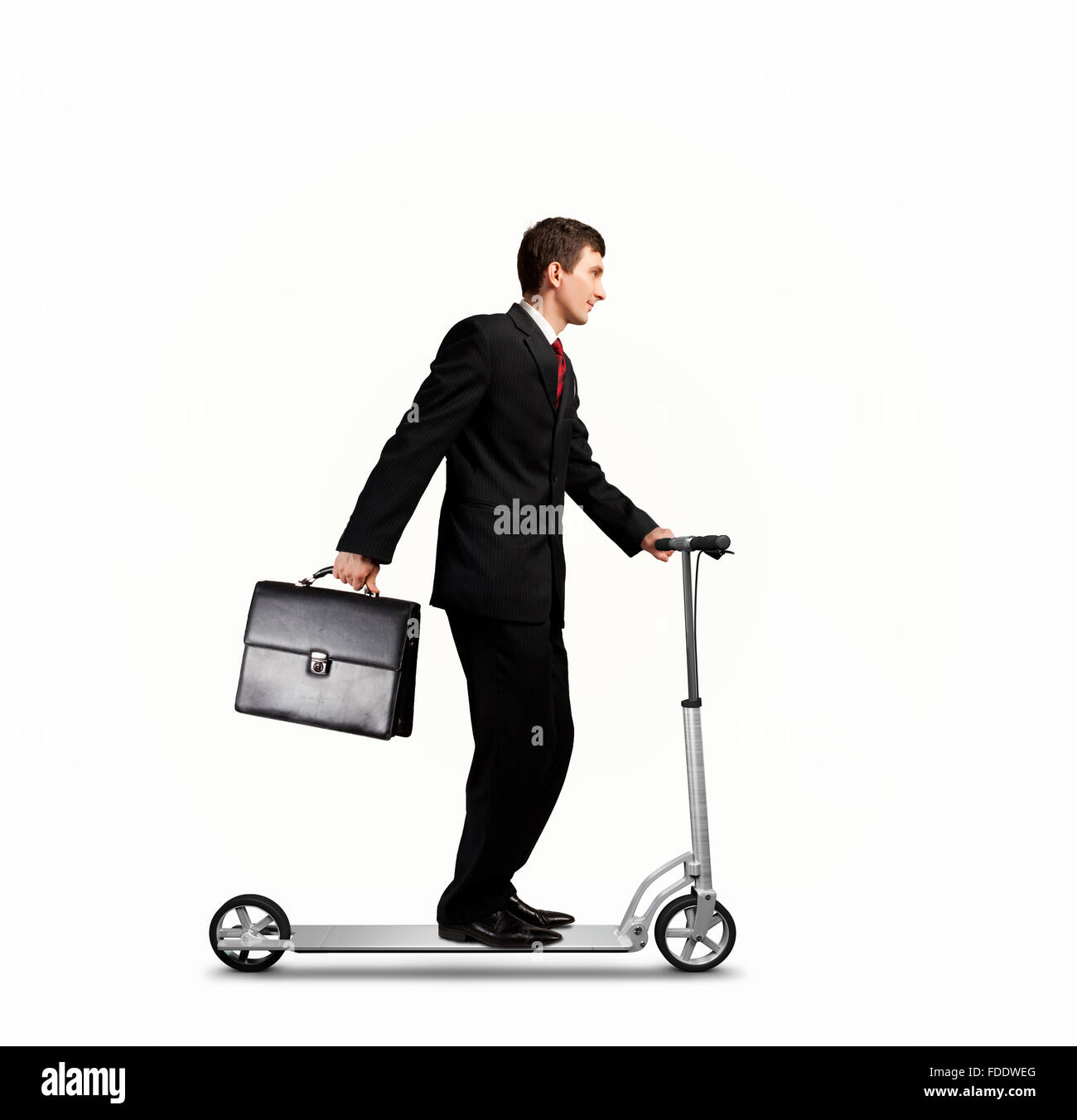 Image of young businessman in black suit riding scooter Stock Photo - Alamy