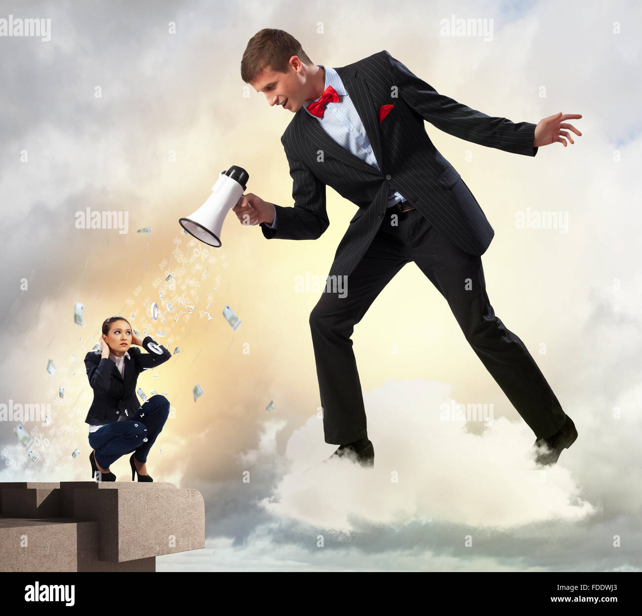 Angry businessman with megaphone shouting at colleague Stock Photo - Alamy