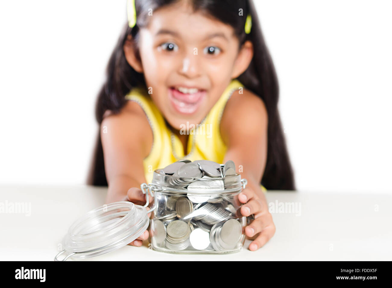 Money jar child hi-res stock photography and images - Alamy