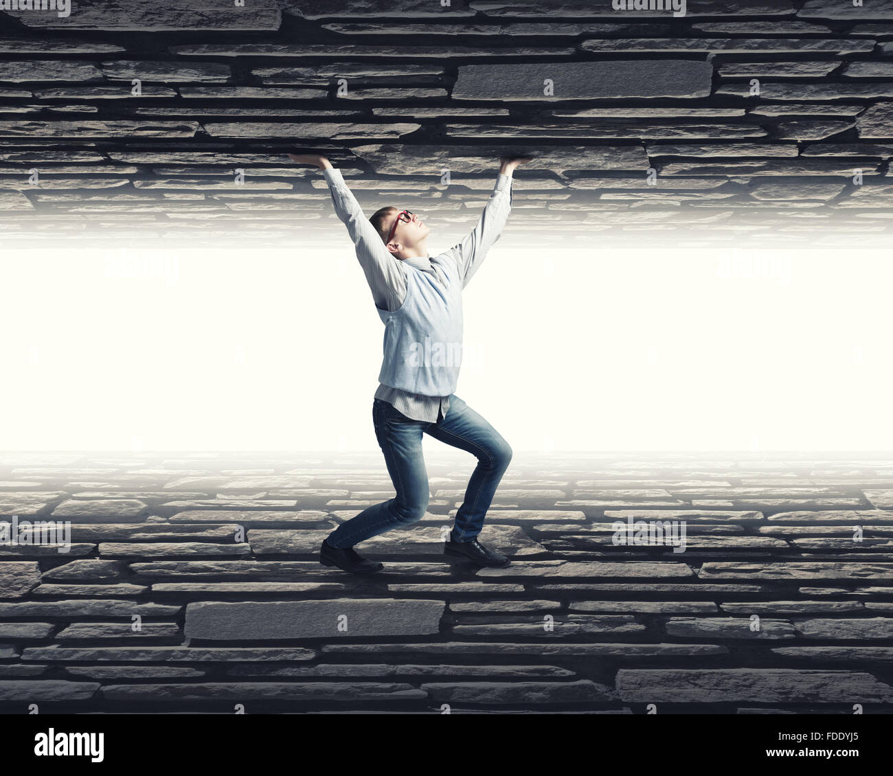 Young troubled businessman trapped between two walls Stock Photo - Alamy