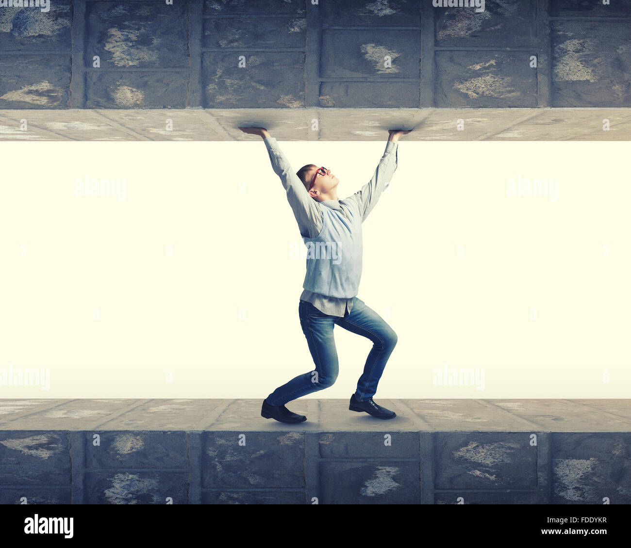 Young troubled businessman trapped between two walls Stock Photo - Alamy