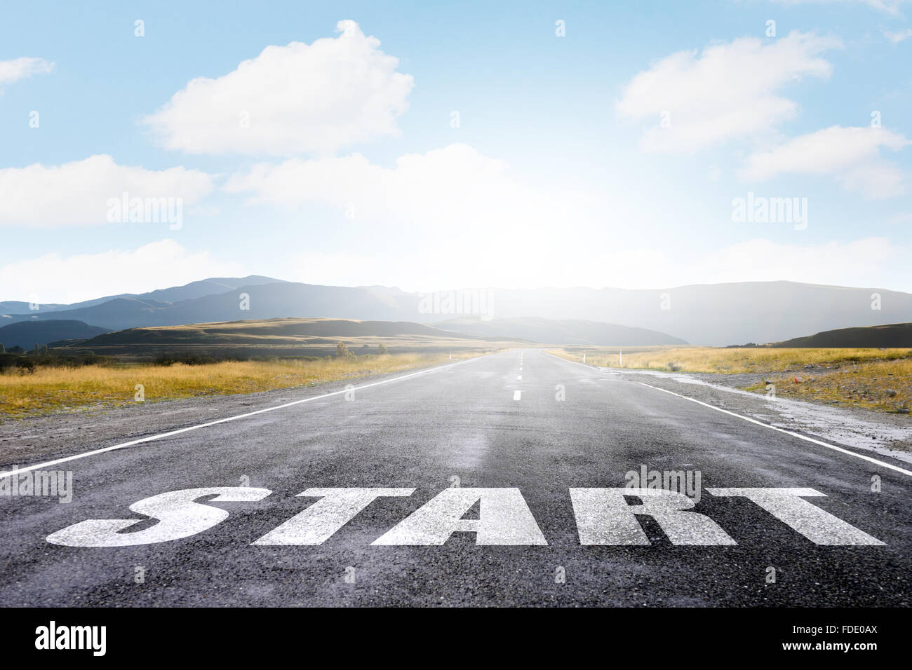 Conceptual image with word start on asphalt road Stock Photo - Alamy