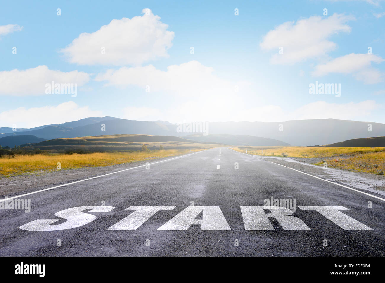 Conceptual image with word start on asphalt road Stock Photo - Alamy