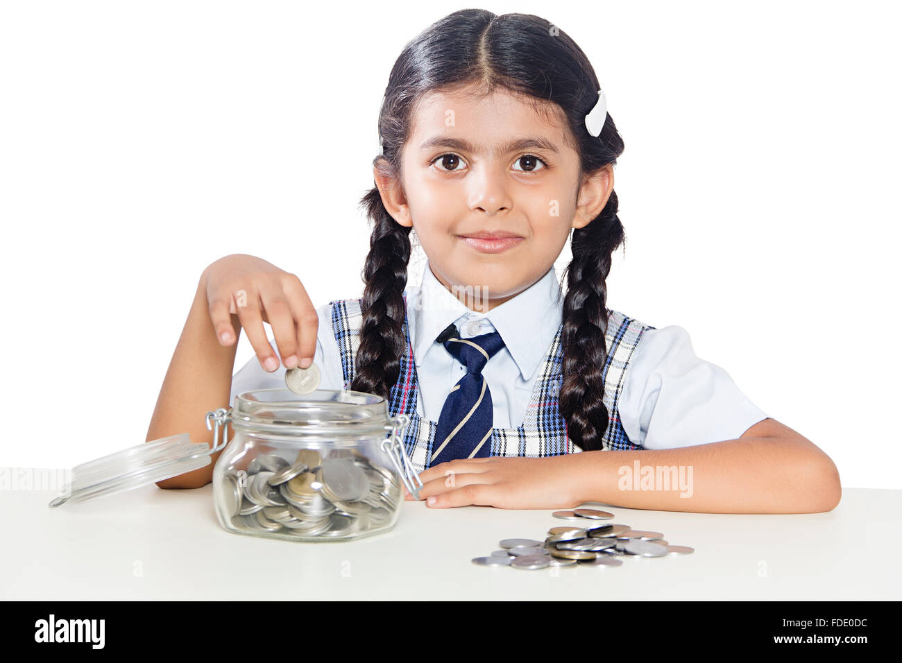 Girl child saving money hi-res stock photography and images - Alamy