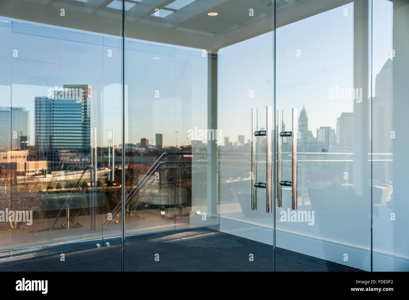Glass doors at SCAD FASH entrance to the Savannah College of Art and ...