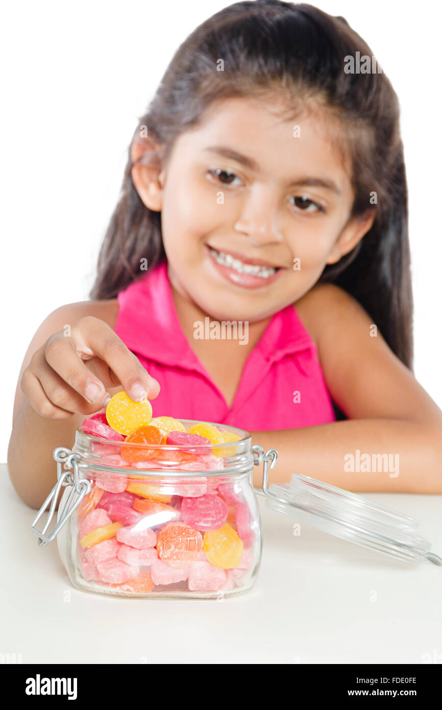 Indian kid eating hi-res stock photography and images - Alamy