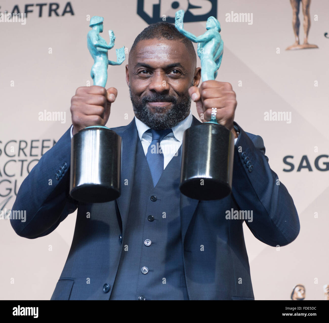 Los Angeles, USA. 30th Jan, 2016. Actor Idris Elba wins the Outstanding ...